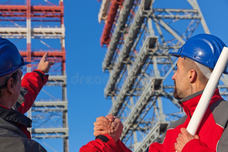Two Engineers at Work stock photo. Image of outdoors - 18393682
