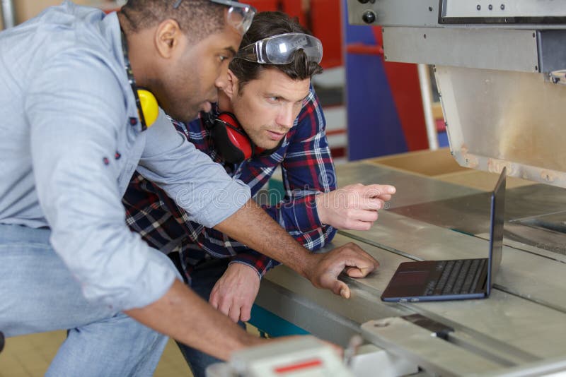 Two Engineers Working on Laptop Computer Stock Image - Image of ...