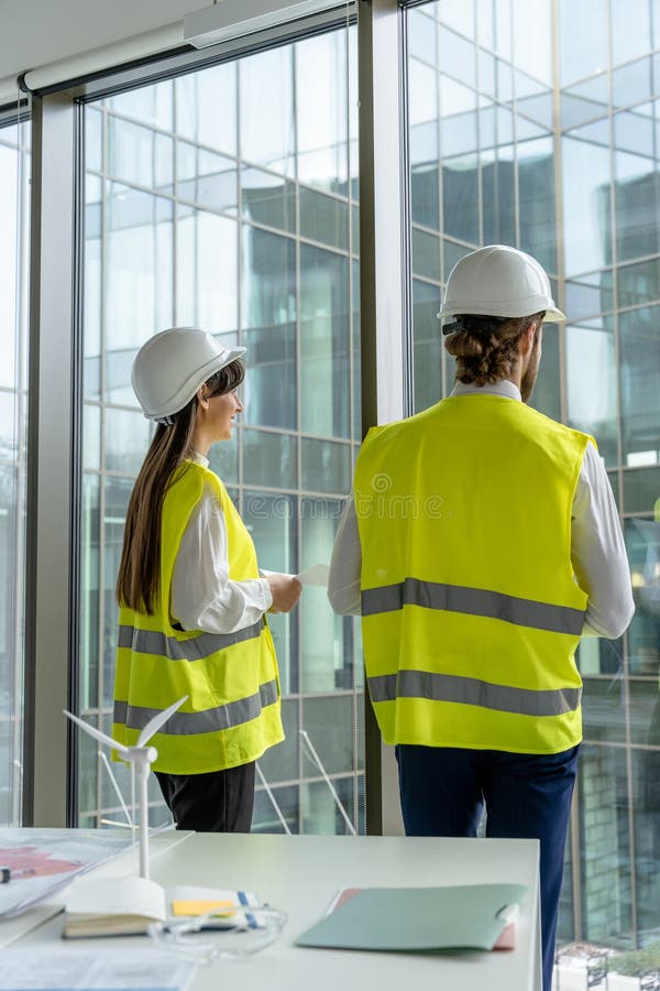 Two Engineers Working in the Office on a New Green Energy Project Stock ...