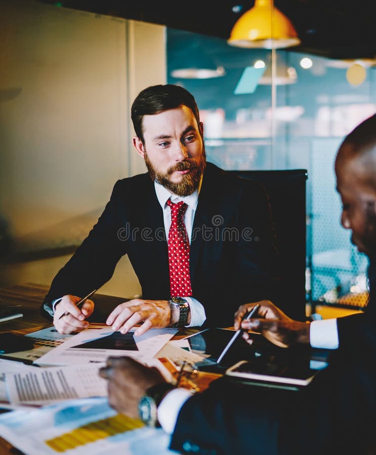 Two Entrepreneurs Working on Solution at Meeting Stock Image - Image of ...
