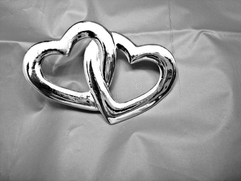 Two Entwined Hearts stock image. Image of wedding, valentine - 4236761