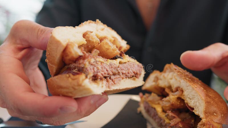 Two Equal Parts of the Gourmet Fish Burger for Lunch Stock Video ...