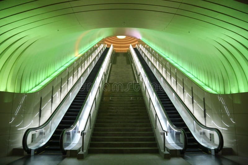 Escalators In Green Light Picture. Image: 99545818