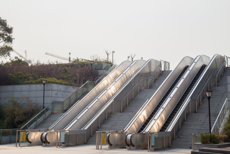 Two Escalators Outside with Sun Reflections Editorial Photo - Image of ...
