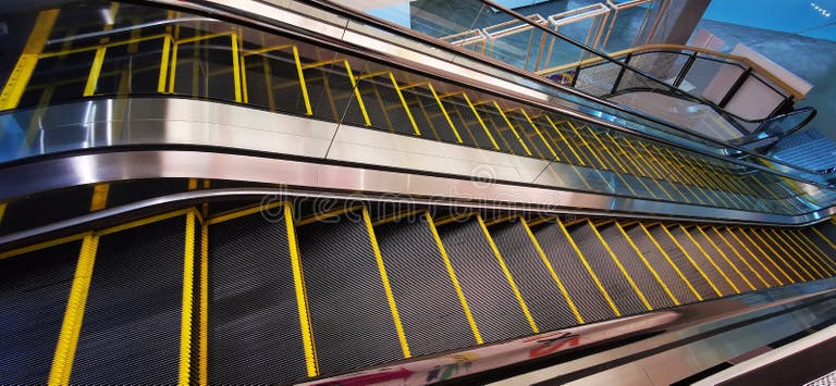 The Two Escalators on the Same Side Have Different Ways of Going Up and ...