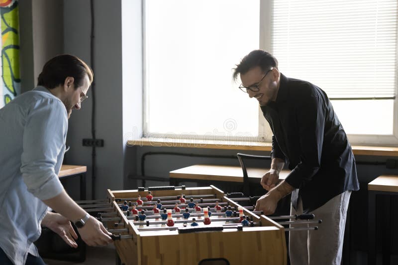 Two Excited Colleagues Having Fun at Workplace during Lunch Break Stock ...