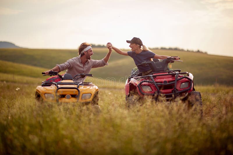 Friends Driving Quad Bikes at the Mountains Stock Photo - Image of ...