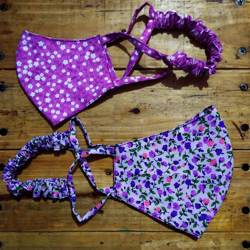 Two Face Masks with Floral Patterns Stock Image - Image of patterns ...