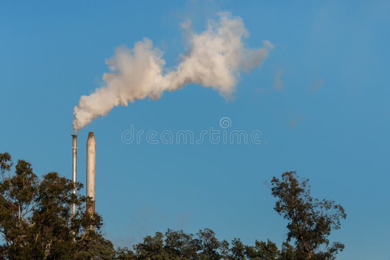 Factory with Smokestacks at Sunset Stock Photo - Image of scenic ...
