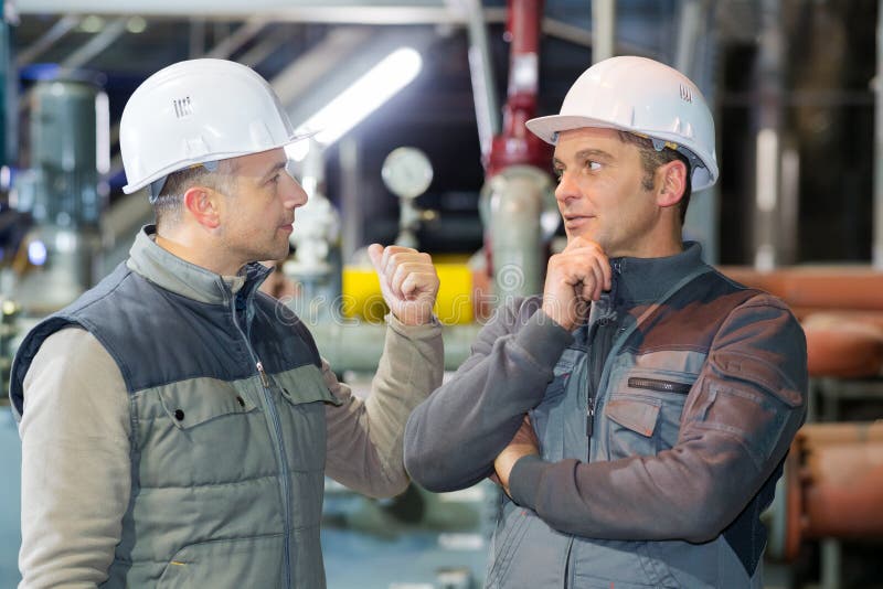 Workers Talking and Laughing at Factory Stock Photo - Image of person ...