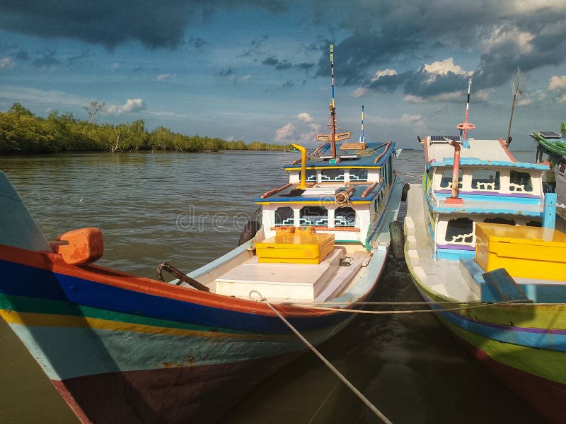 Two Fairly Large Fishing Boats Stock Photo - Image of river, boating ...