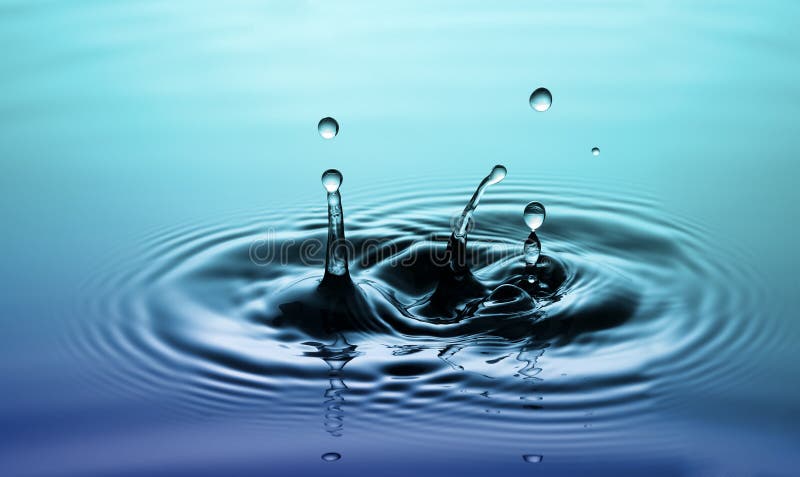 Two falling water drops stock photo. Image of impact - 129357504
