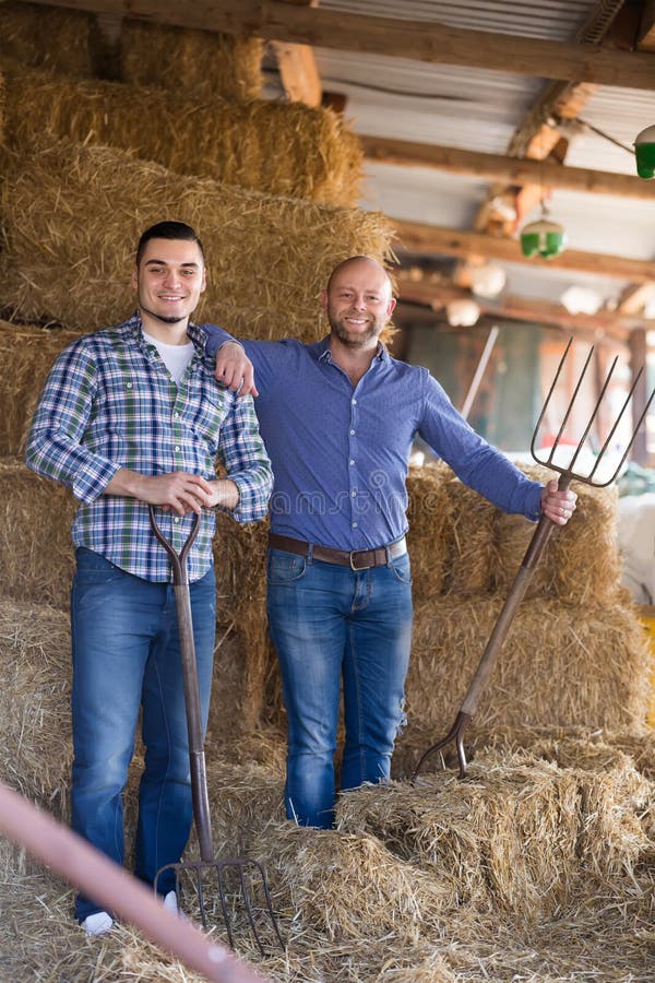 301 Two Farmers Working Barn Stock Photos - Free & Royalty-Free Stock ...