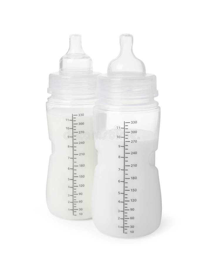 Two Feeding Bottles with Infant Formula on White Background Stock Photo ...