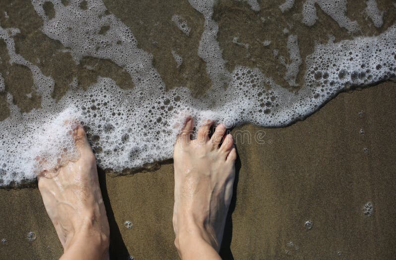 Feet on the Seashore and Wave with Foam Stock Image - Image of beach ...