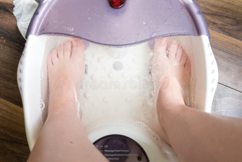 Two Feet Pampering Pedicure Wash in a Specialized Foot Spa with Massage ...