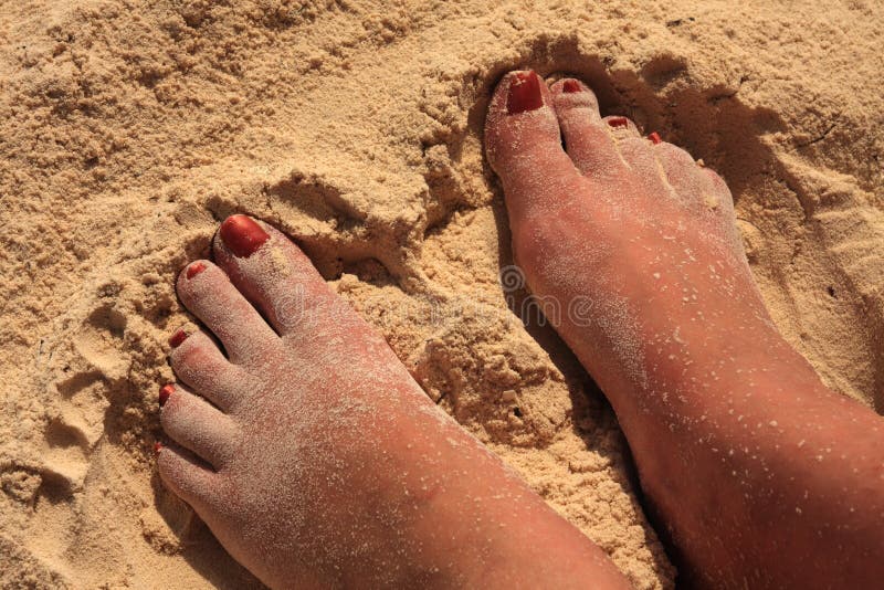 Two feet in the sand stock image. Image of nail, girl - 12722493