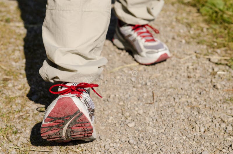 Two Feet with Shoes are Hiking Stock Photo - Image of sport, walk: 32869792