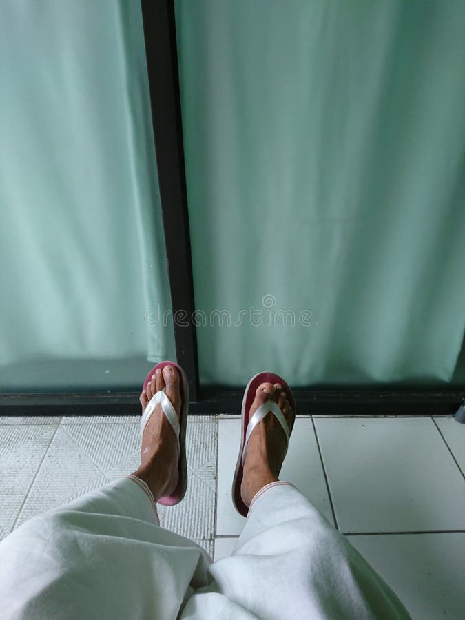 Two Feet Wearing Maroon Sandals Stock Image - Image of limb, light ...