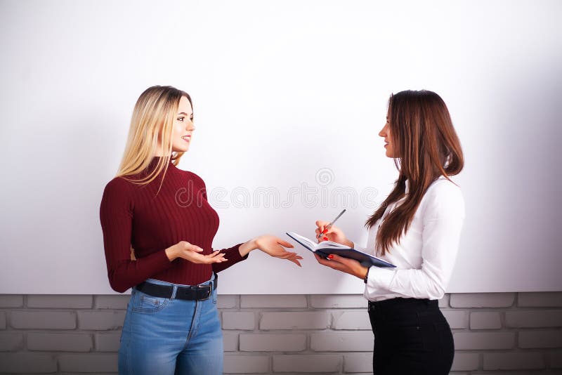 Two Female Colleagues in Office Working Together. Stock Image - Image ...