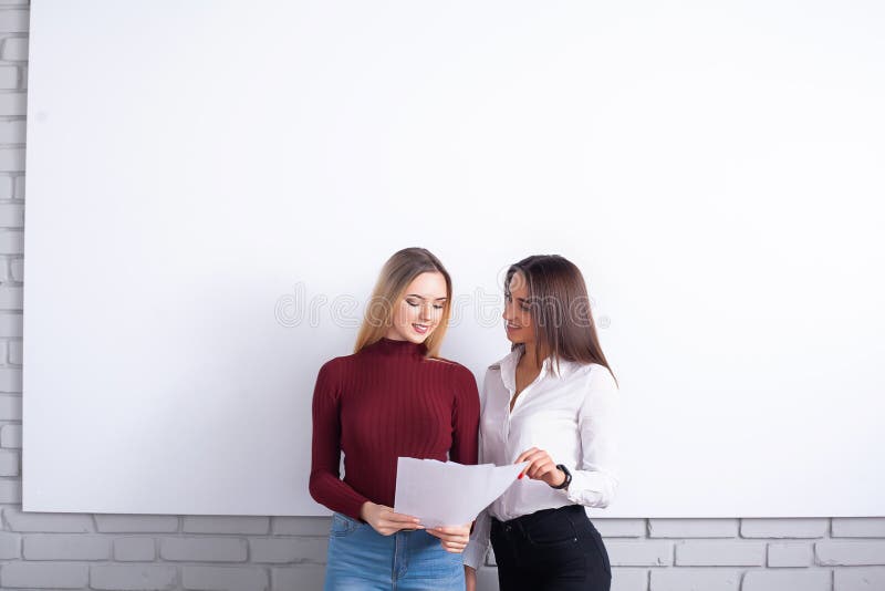 Two Female Colleagues in Office Working Together Stock Photo - Image of ...
