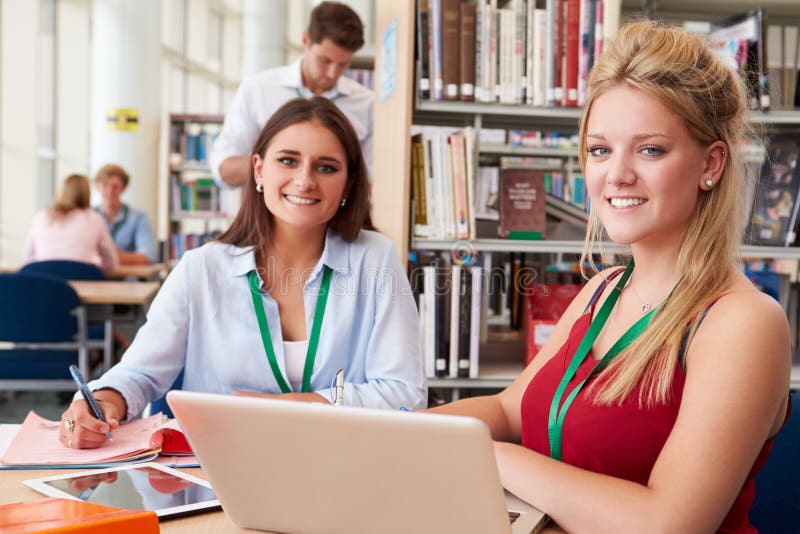 Two Female College Students Studying in Library Together Stock Image ...