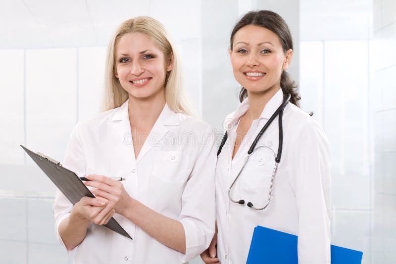 Two female doctors stock photo. Image of benevolence - 11620594