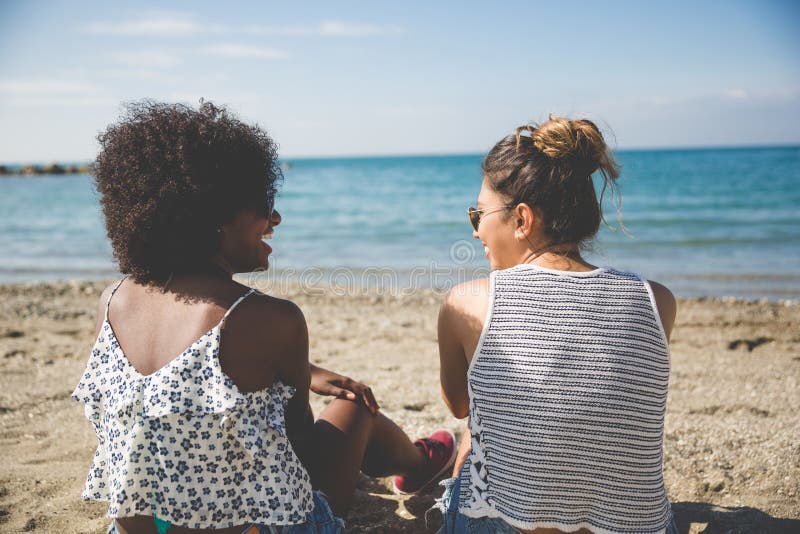 Two Female Friends on Beach Laughing Stock Image - Image of american ...