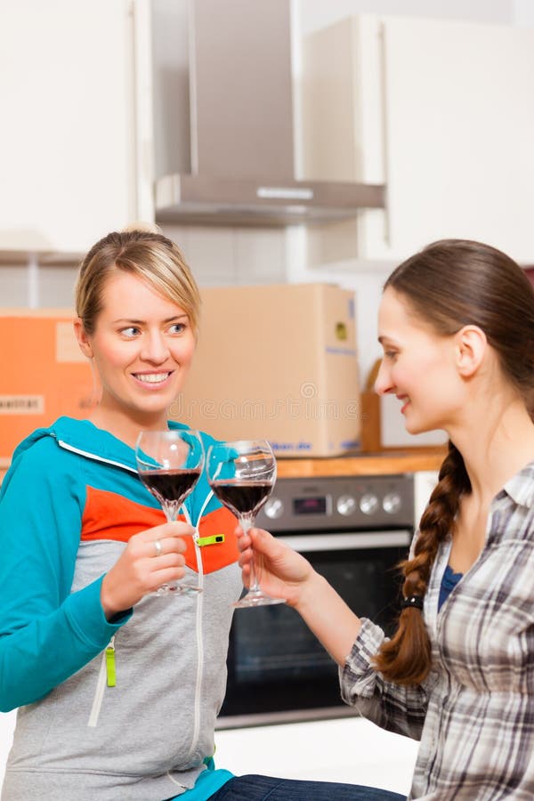 Friends moving in together stock photo. Image of residence - 29642302