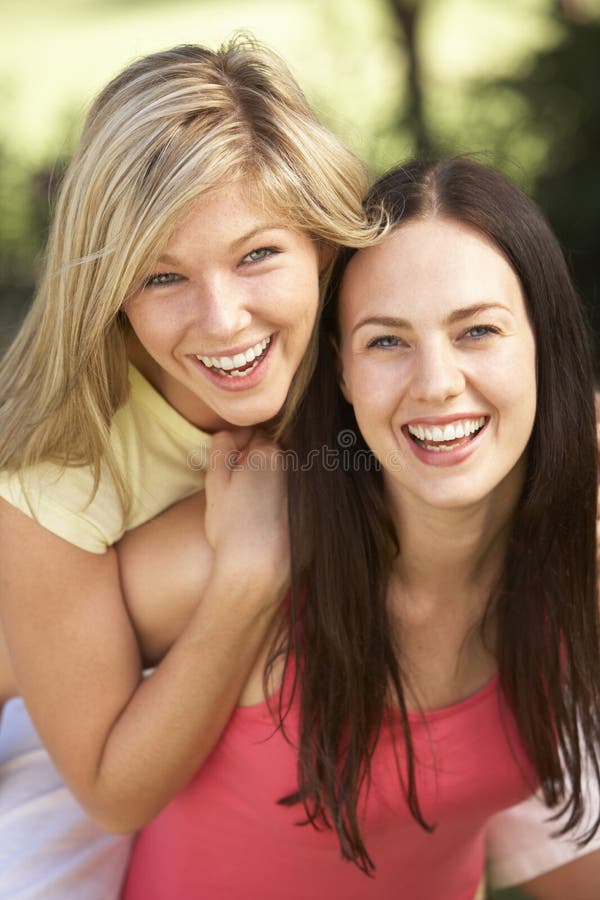 Two Female Friends Relaxing Together Stock Photo - Image of people ...