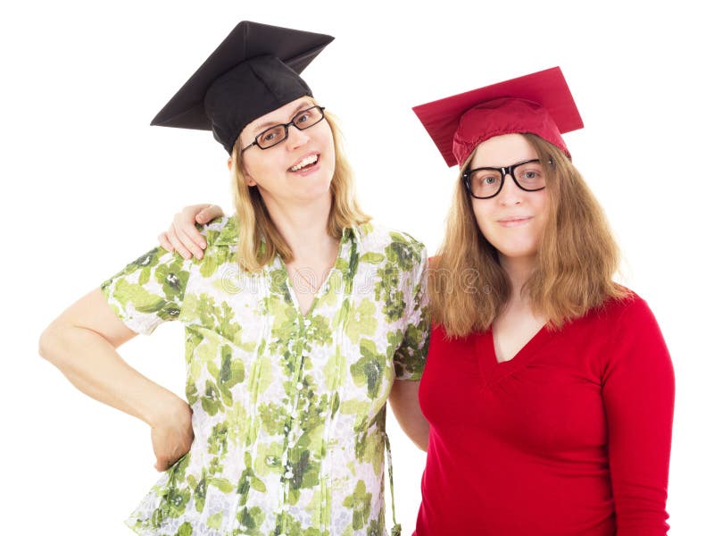 Two female graduates stock image. Image of maturation - 30787583