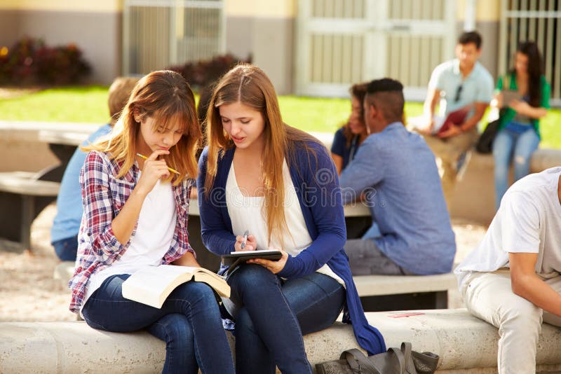 Two Female High School Students Working on Campus Stock Image - Image ...