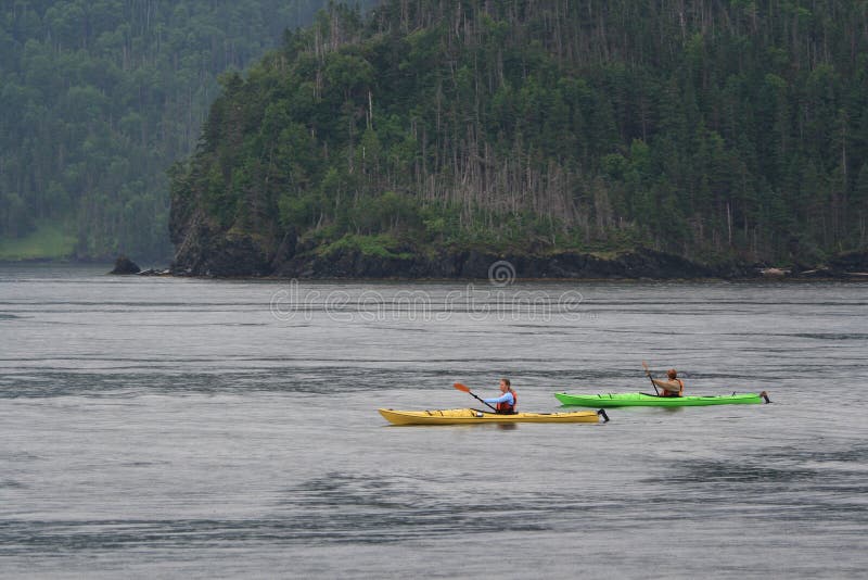 Two Female Kayakers in the Rain Editorial Stock Image - Image of trees ...