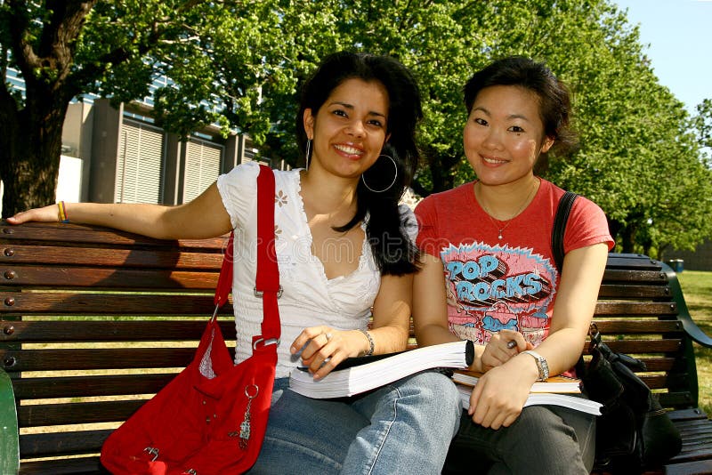 Two female students. stock image. Image of asian, teen - 12583577