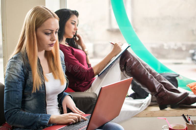 Two Female Students Learning at University Stock Photo - Image of ...