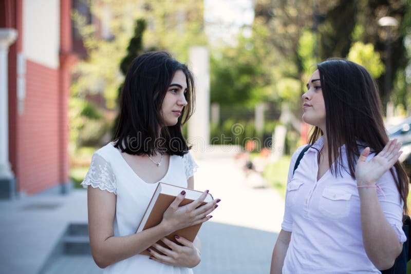 Two Female Students Talking about Their Struggles on the Campus Stock ...