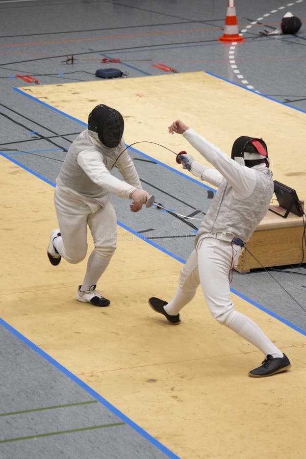 Two Fencers Fencing for the Victory Editorial Photo - Image of glove ...