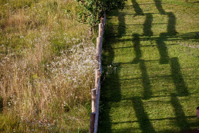 Two Fields Separated Wooden Fence Stock Photo - Image of landscape ...