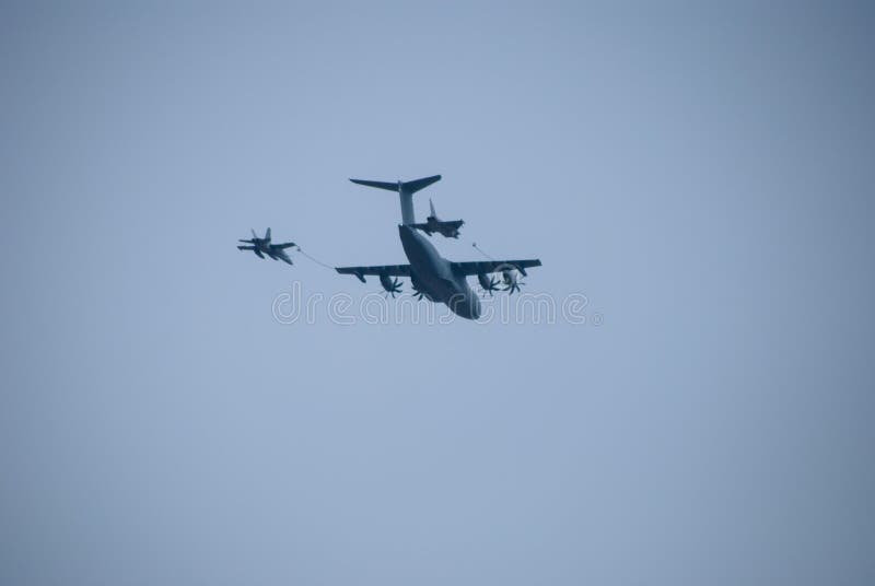 Two Fighter Jets Refueling in Flight from a Nurse Plane or Tank Plane ...