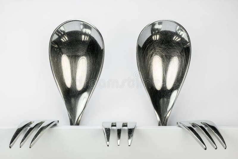 Two Figures Made of Spoons and Forks Stock Image - Image of shape ...