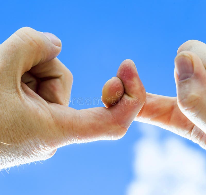 Two fingers with blue sky stock image. Image of strong - 44887495
