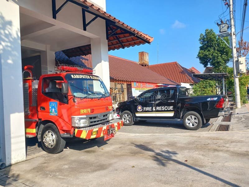 Two Fire Engines, One Black and One Red Editorial Photography - Image ...