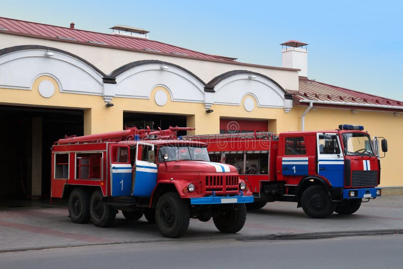 Two Fire Trucks Near Fire Station Stock Image - Image of alarm, danger ...