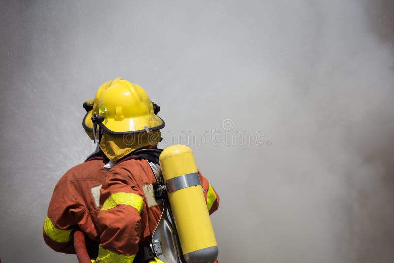 Two Firefighters Fire Fighting Suround with Dark Smoke Stock Photo ...