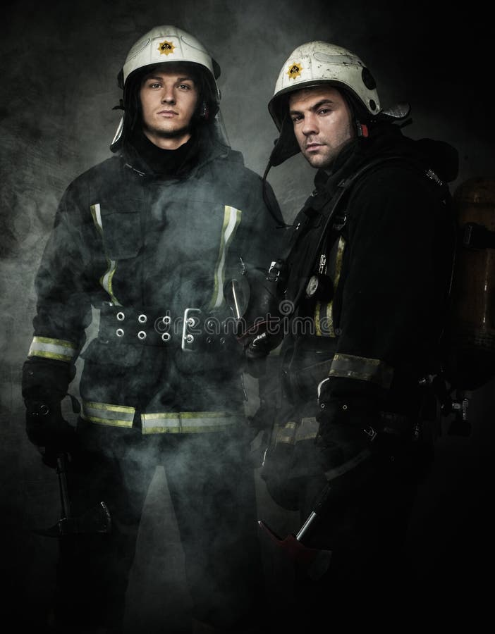 Two Firefighters in a Smoke Stock Image - Image of danger, emergency ...