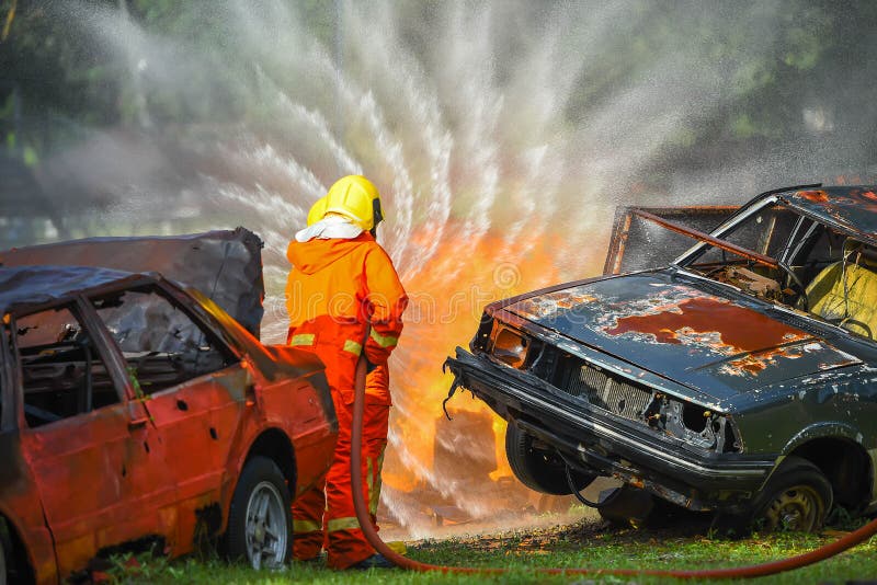 Three Firefighters Water Spray with High Pressure To Fire Surround with ...