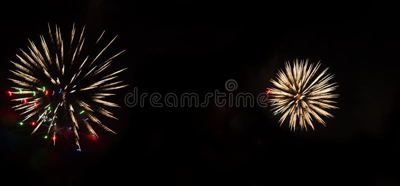 Two fireworks in night sky stock photo. Image of celebration - 256113680