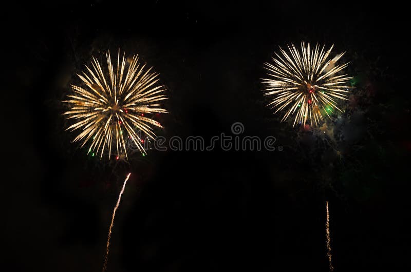 Two fireworks on night sky stock photo. Image of abstract - 257795208