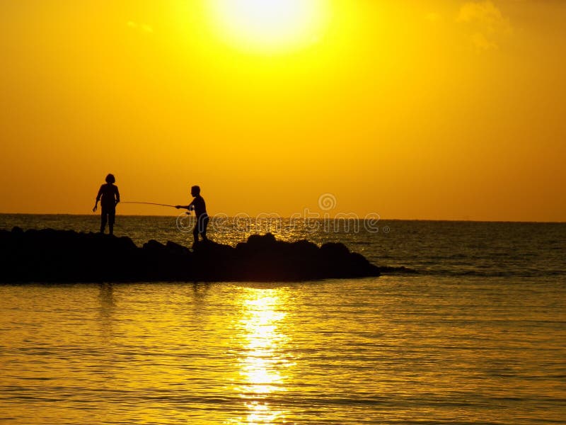 Two Fishing Friend at Sunset Sea Stock Image - Image of friend, lake ...
