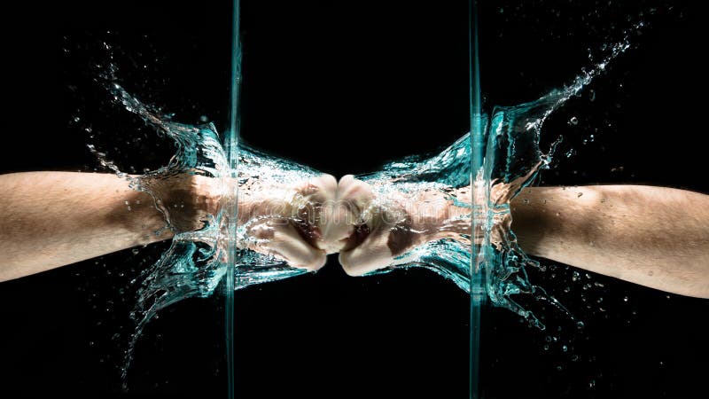 Fist through water stock photo. Image of force, rage - 23333430